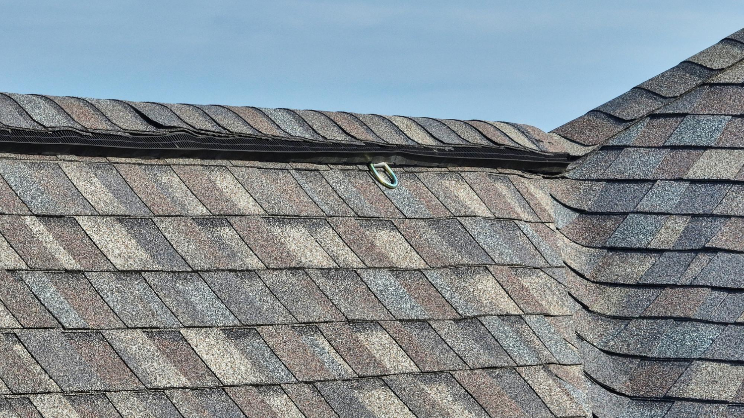 Why Roof Shingles Curl & Solutions